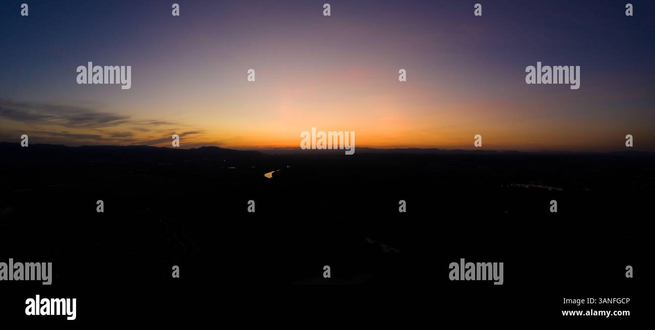 Panoramic aerial view of silhouette sunset, behind mountains, Zagreb ...