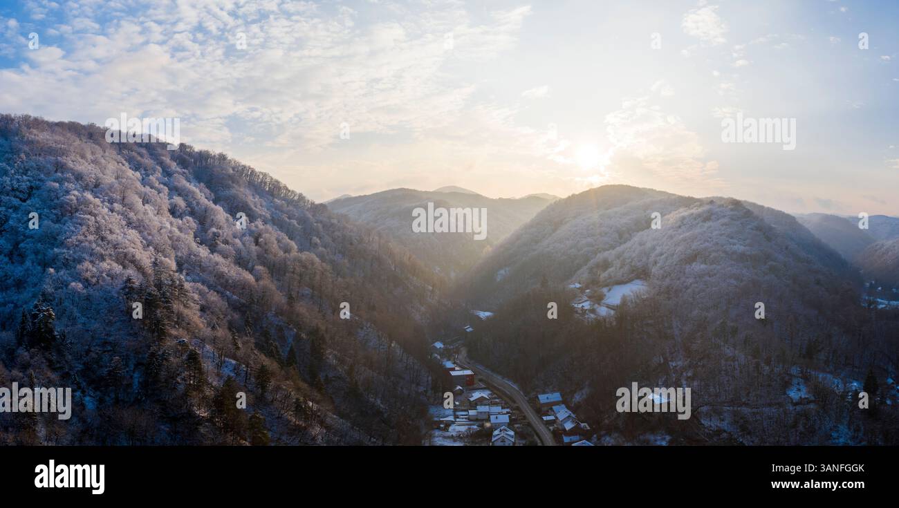 Aerial view of Zumberak mountain range during a scenic winter sunset ...