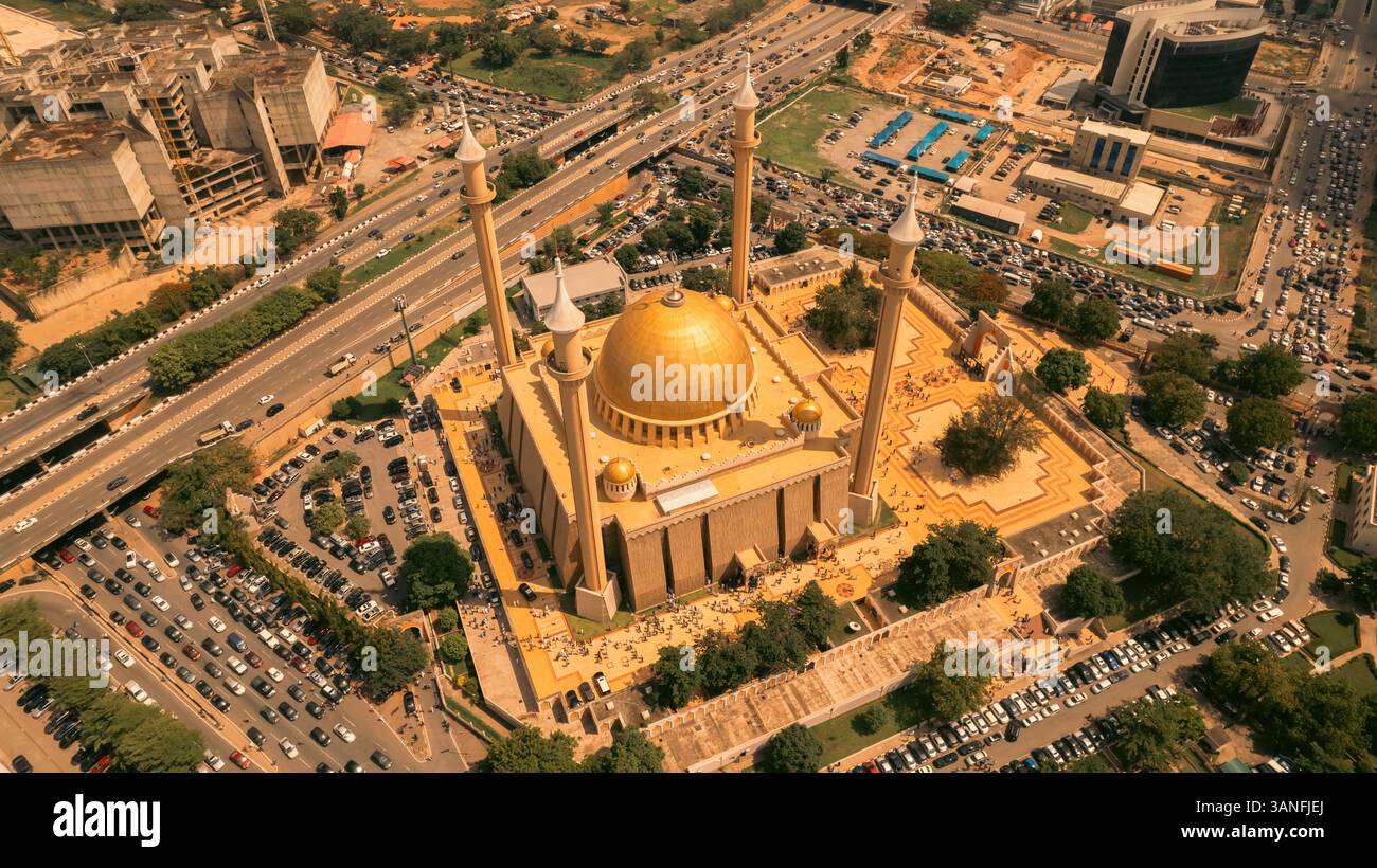 Aerial view of abuja national mosque with golden dome and minarets in a ...