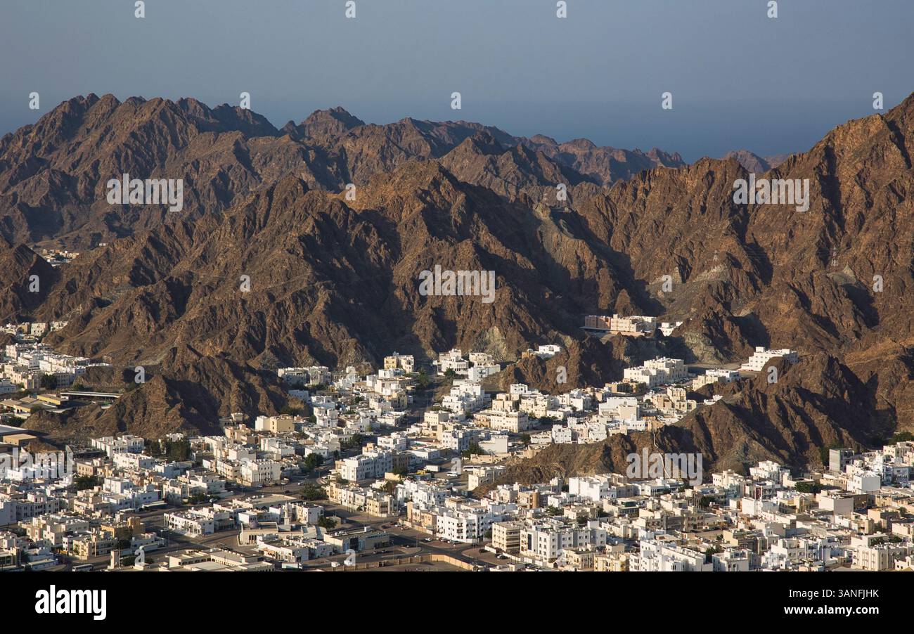 Aerial view of old town Muscat with majestic mountains and scenic ...