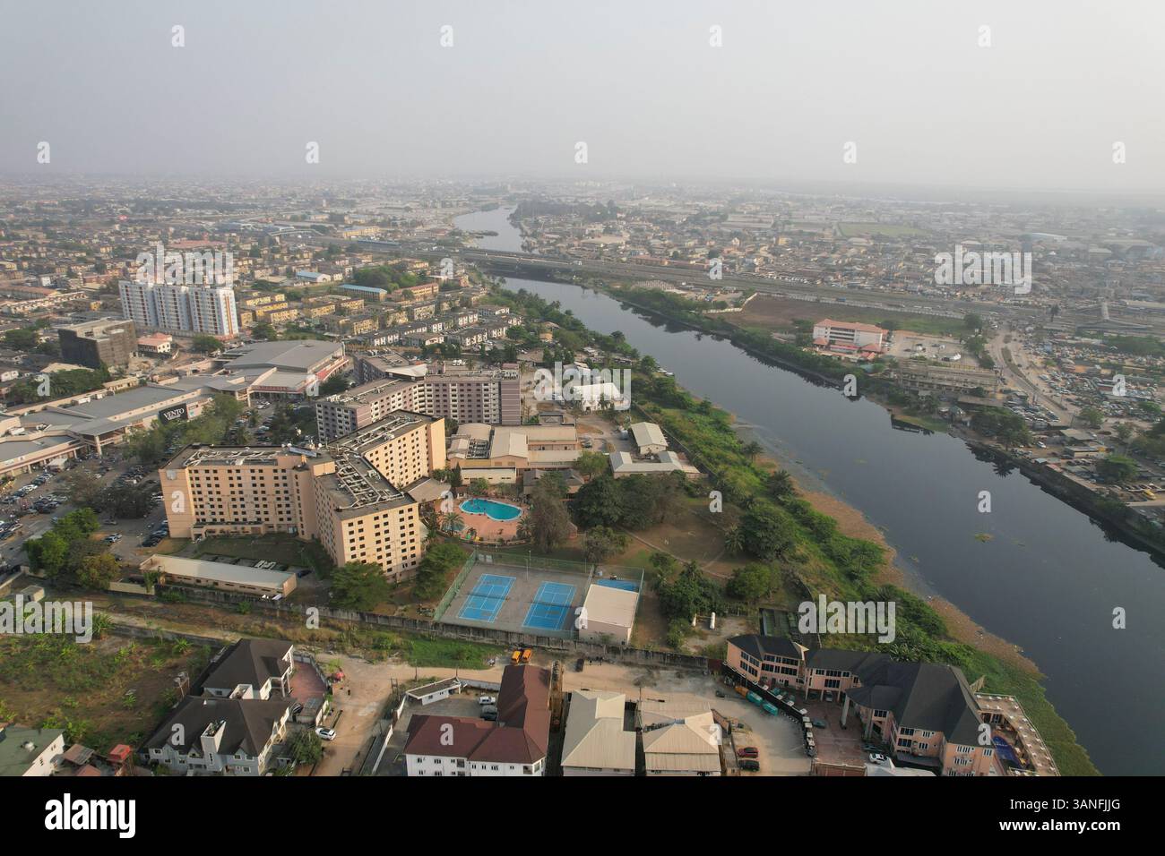 Aerial view of a beautiful urban landscape with modern buildings and a river, Lagos, Nigeria ...