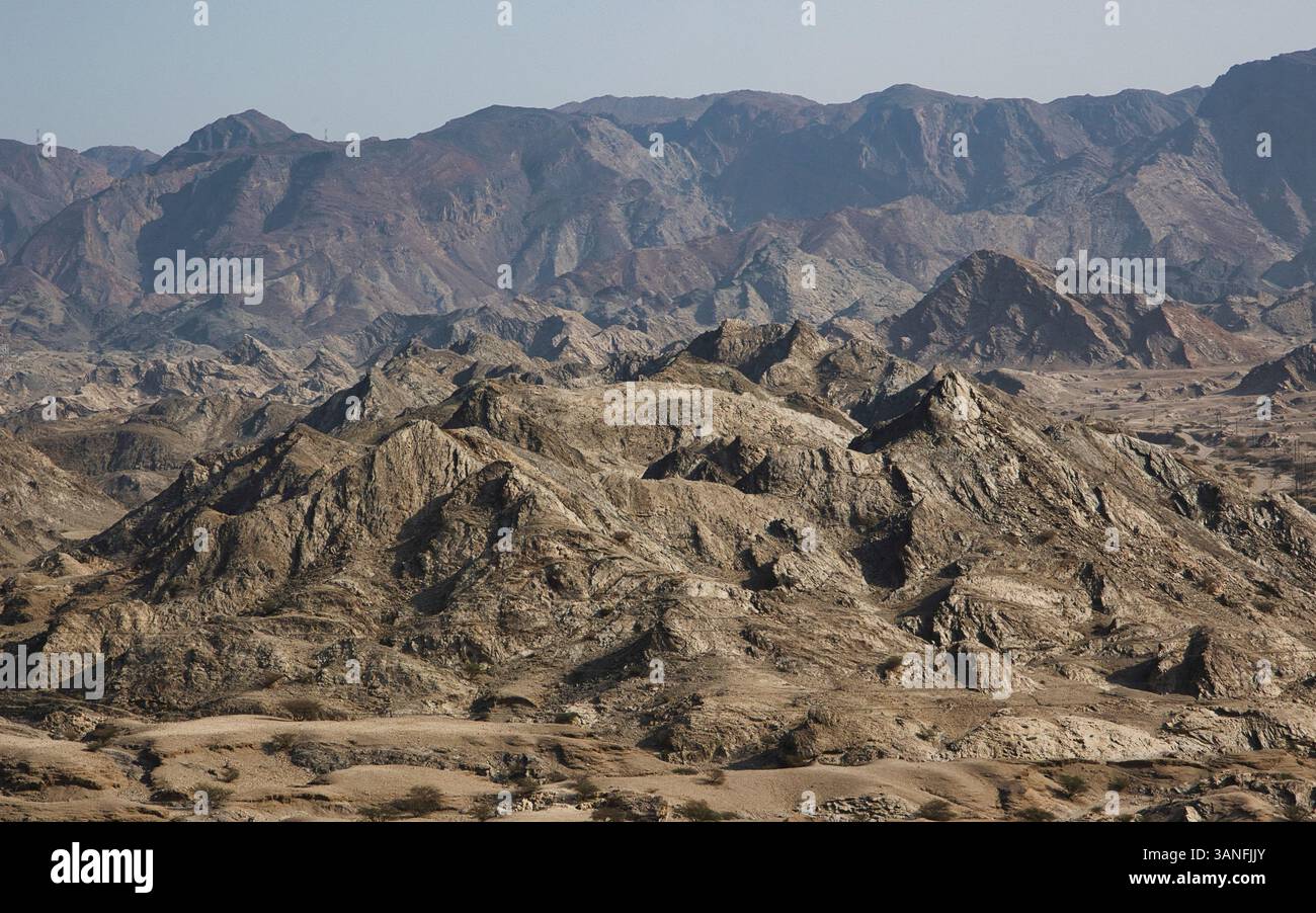 Aerial view of old town Muscat surrounded by majestic mountains and ...
