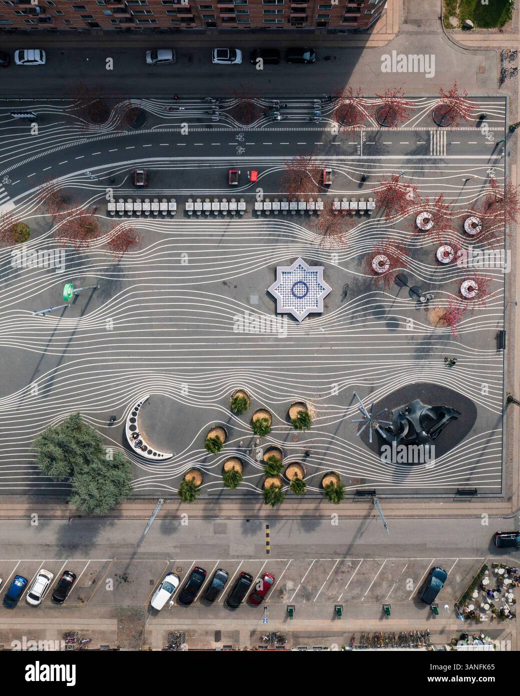 Aerial view of vibrant superkilen park with artistic sculptures, trees ...