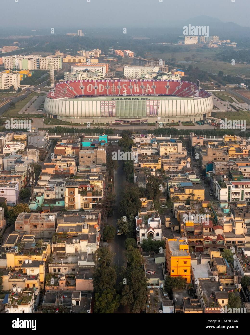 Odisha, India - February 25: Aerial view of a modern stadium surrounded ...
