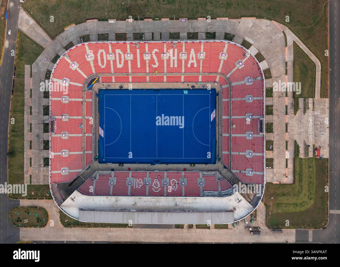 Odisha, India - February 25: Aerial view of a modern stadium surrounded ...