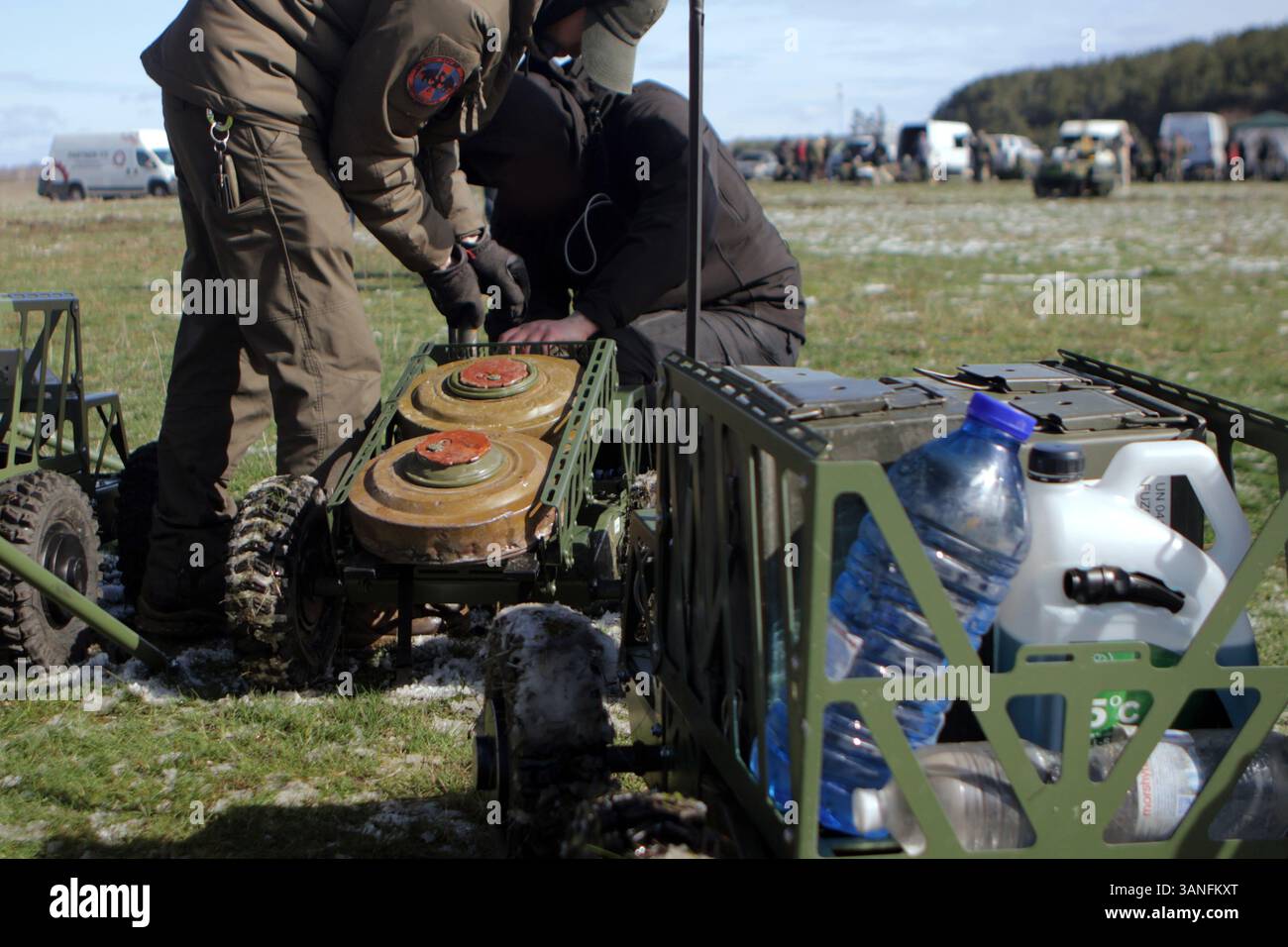 Two men man a ground-based robotic complex during Ukraine’s most ...