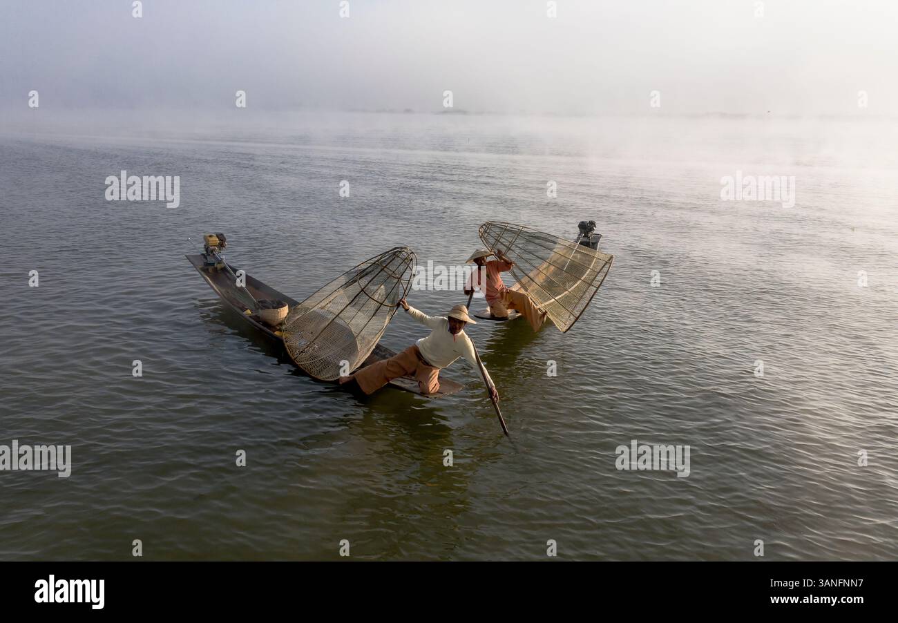 Aerial view of Mangrove fisherman fishing in beautiful Inle Lake ...