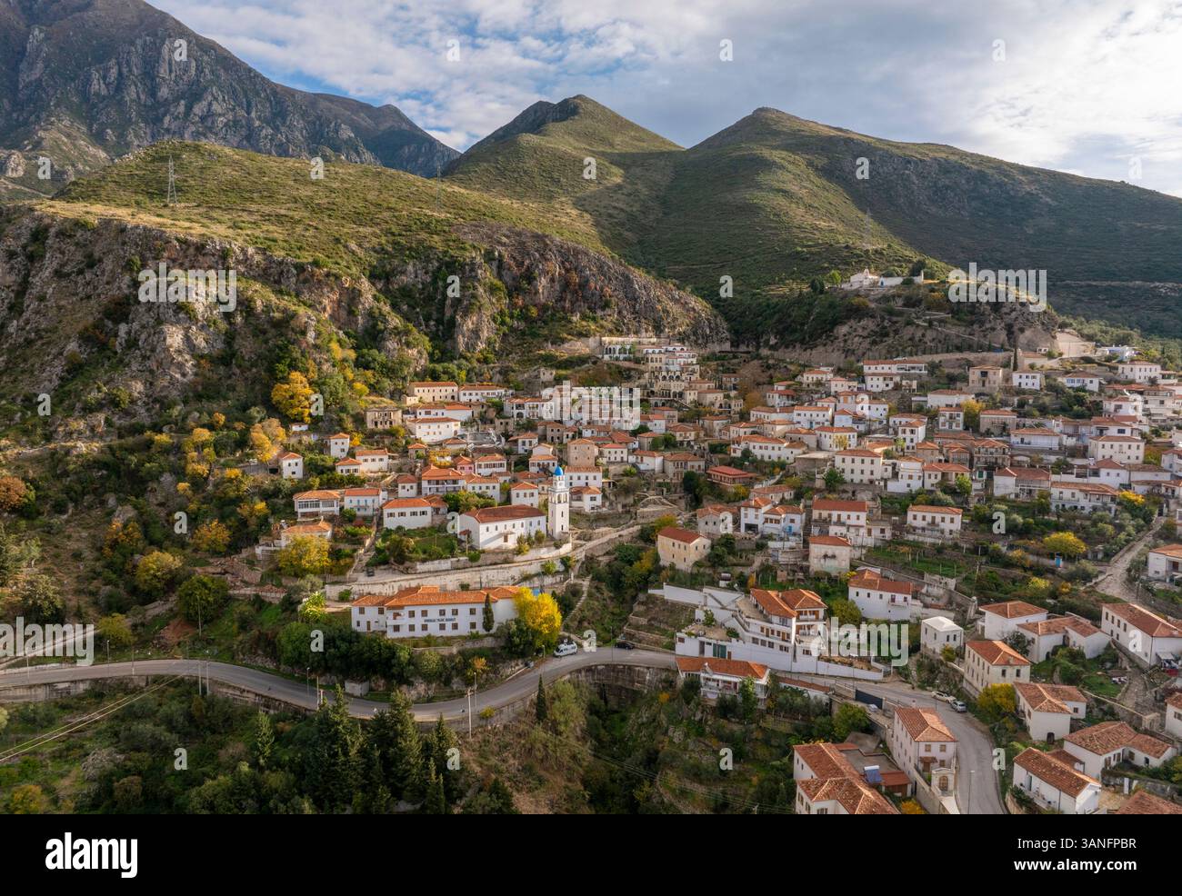 Aerial view of picturesque village nestled in serene mountains with ...