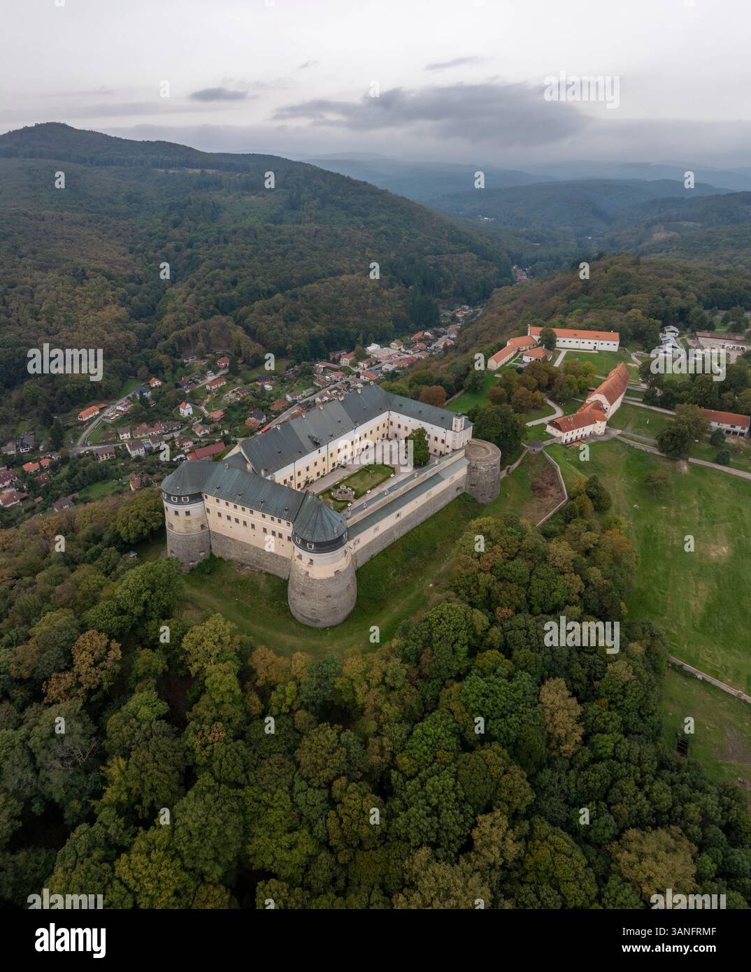 Aerial view of cerveny kamen castle surrounded by beautiful green ...