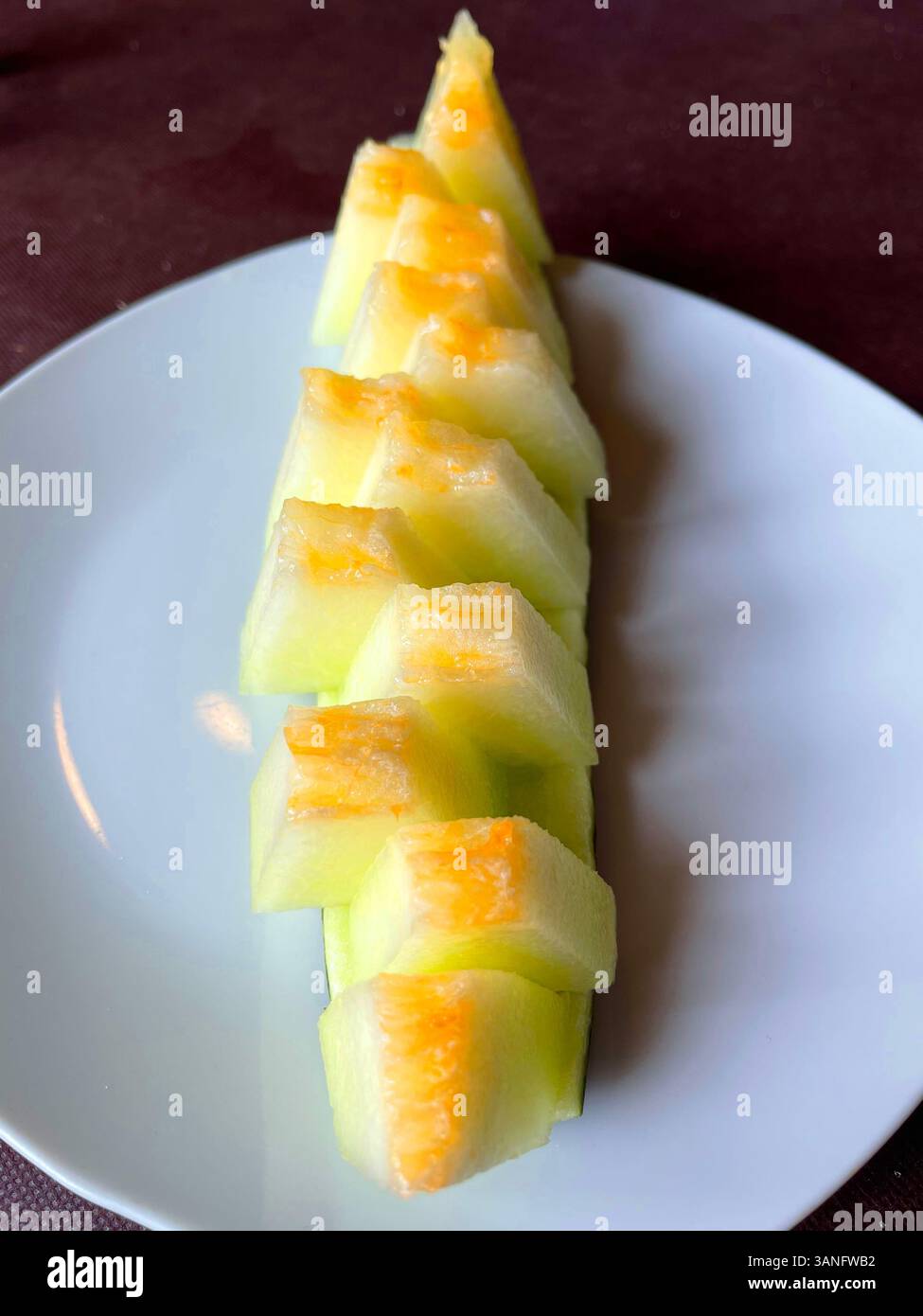 Cut melon pieces hi-res stock photography and images - Alamy