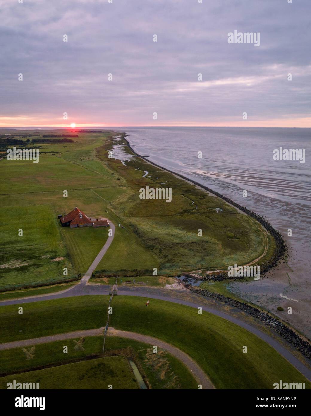 Aerial view of serene sunrise over the wadden sea with a picturesque ...