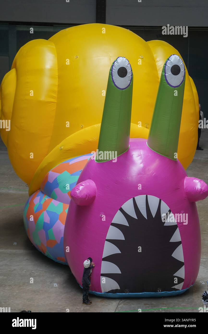 London UK 15 April 2025. Visitors interact with a larger-than-life ...