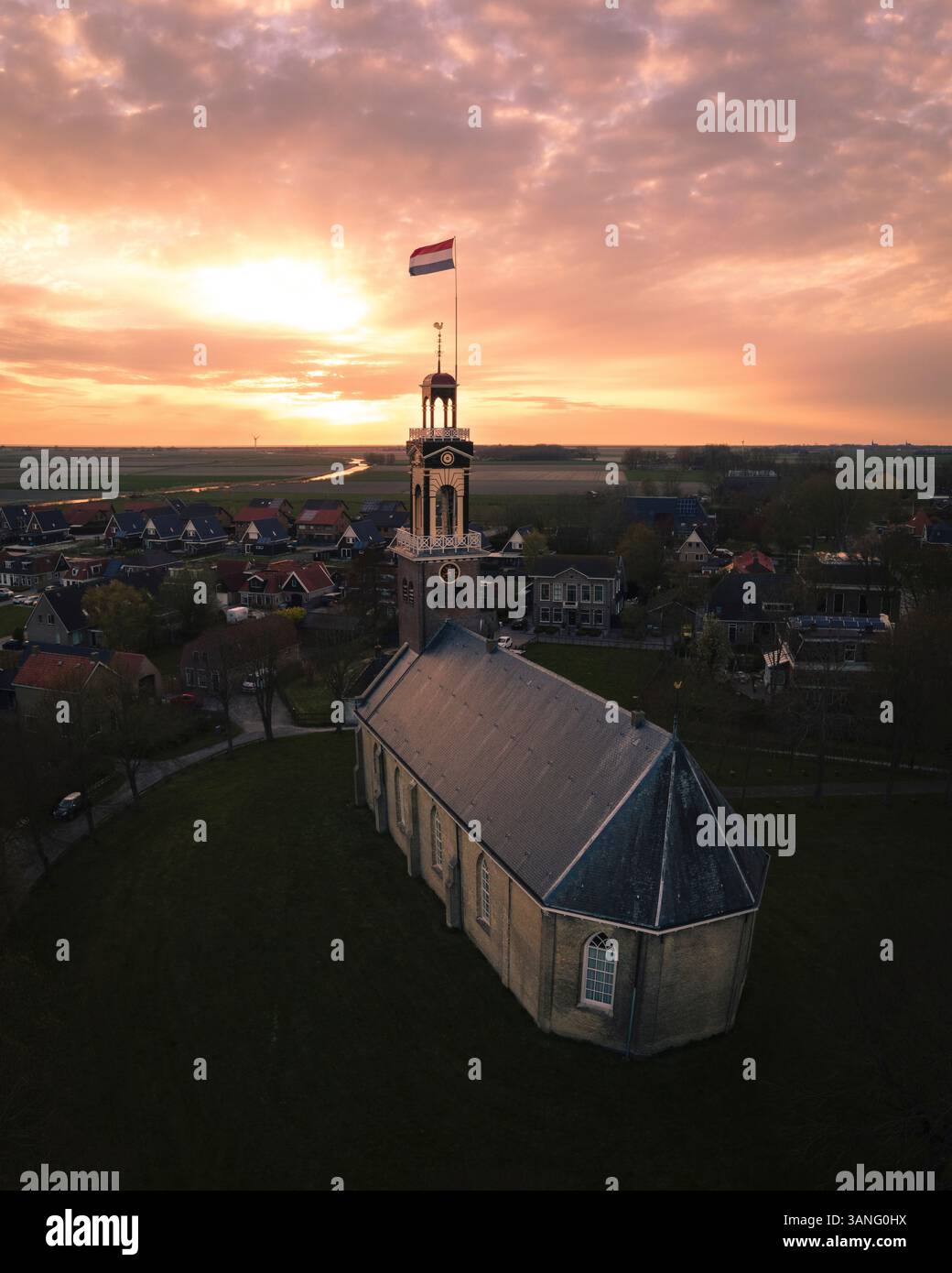 Aerial view of a picturesque village with a charming church and dutch ...
