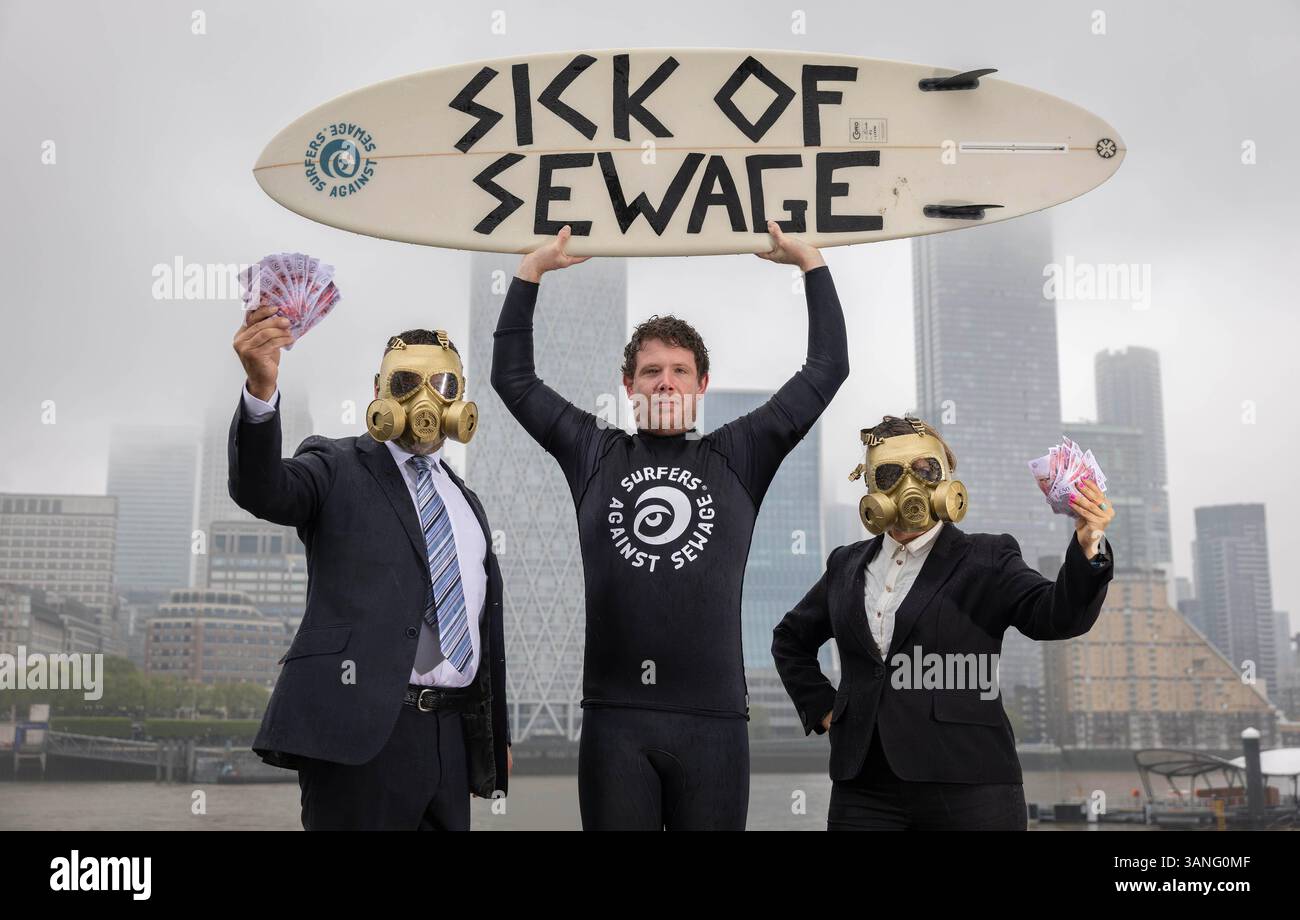 EDITORIAL USE ONLY Campaigners from Surfers Against Sewage gather in ...
