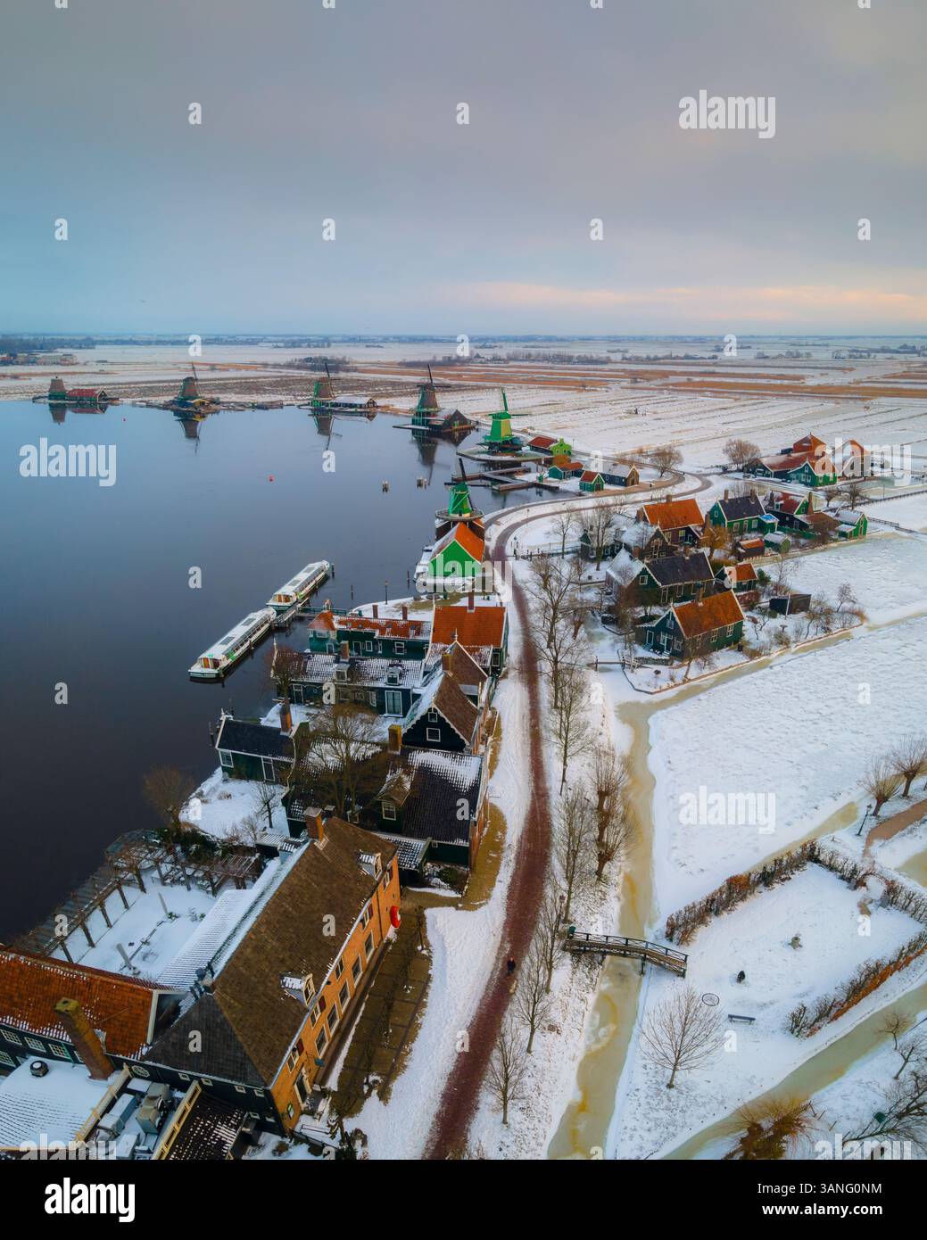 Aerial view of a picturesque winter wonderland with traditional ...