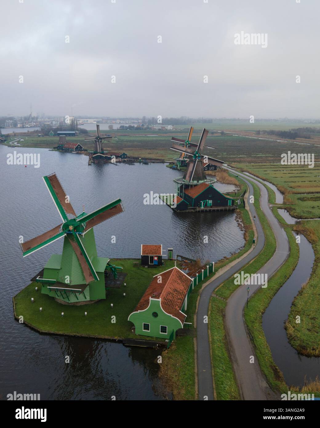 Aerial view of traditional windmills and picturesque fields by the ...