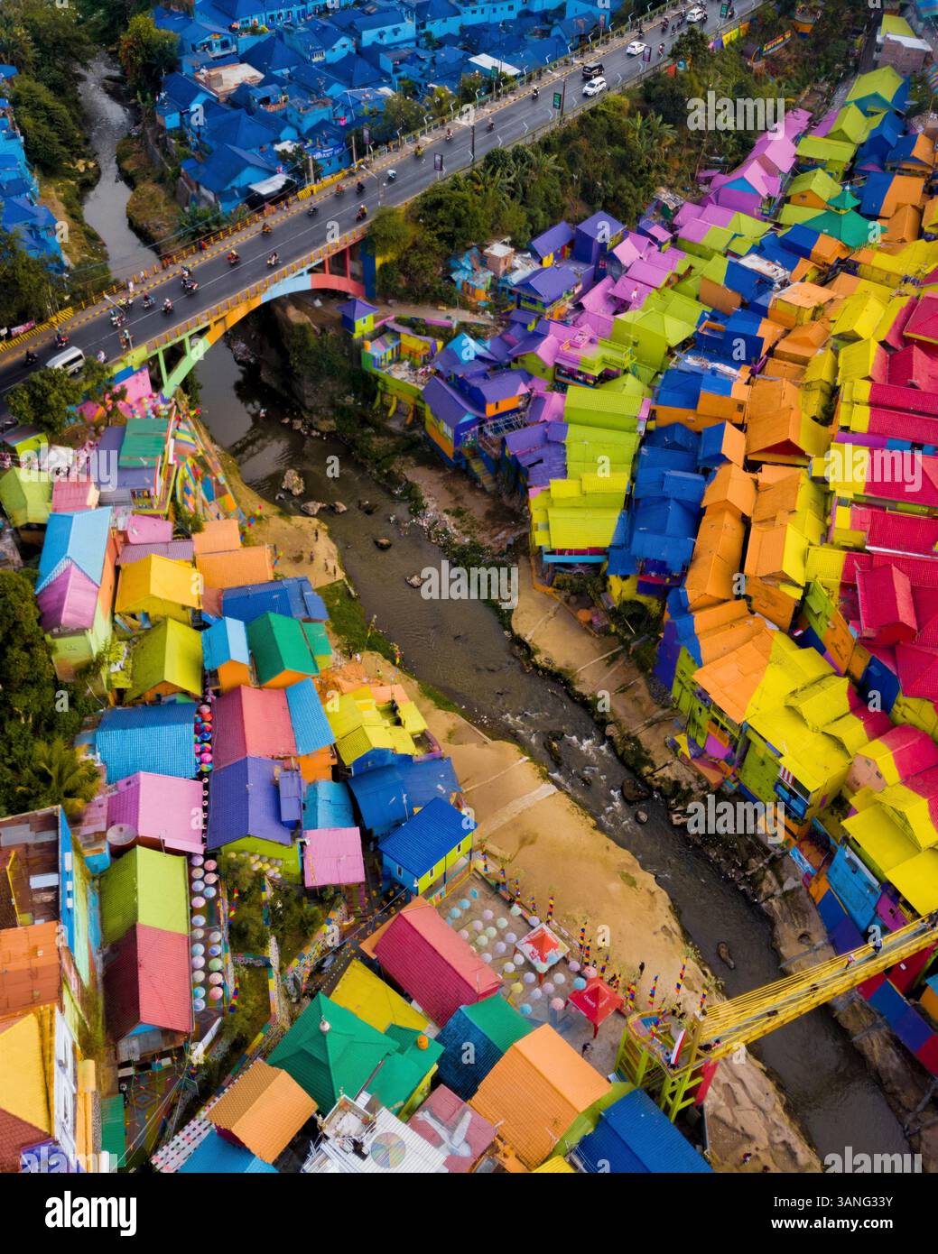 Aerial view of colorful houses in Jodipan, rainbow village with a river ...