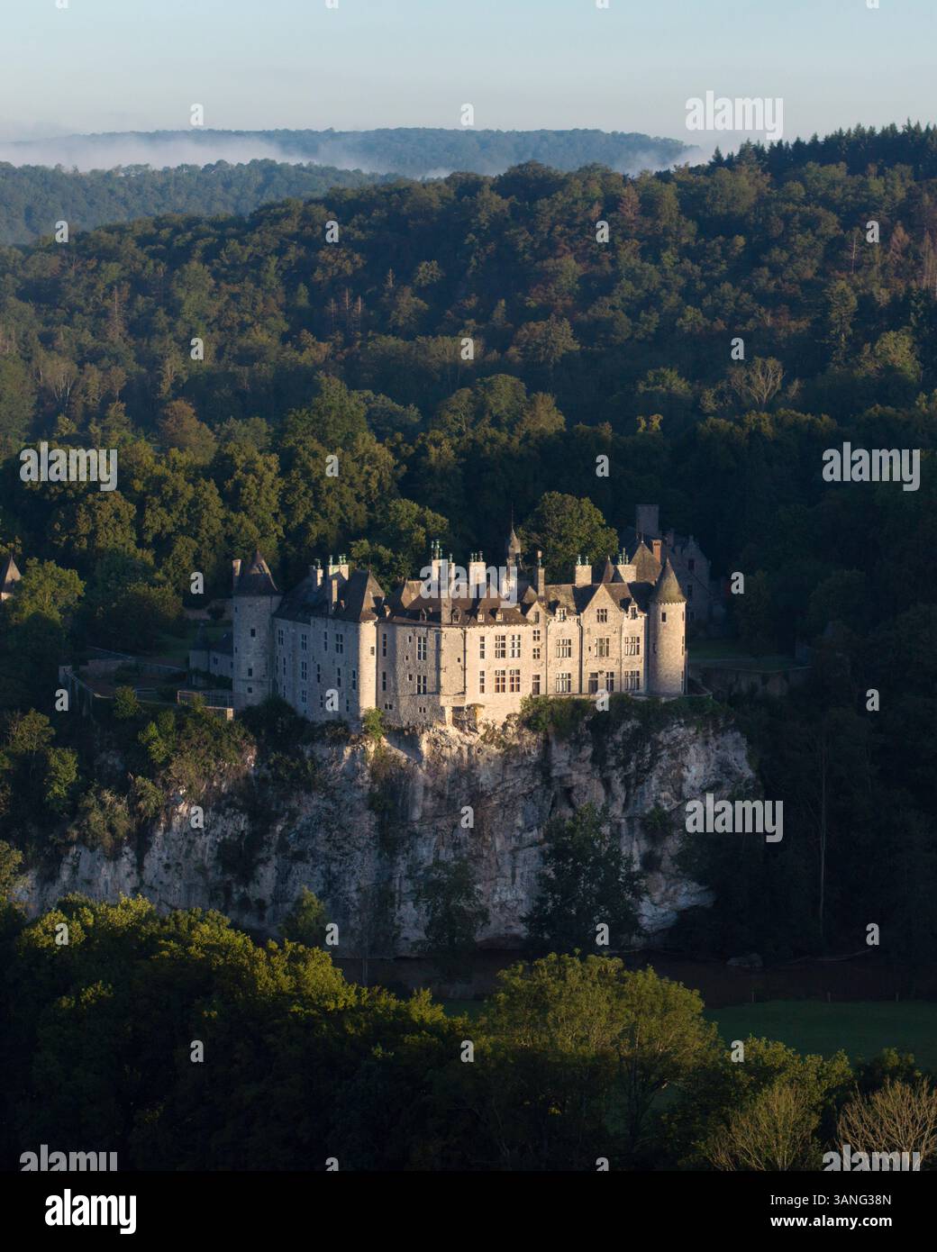 Aerial view of the medieval Walzin castle surrounded by tranquil forest ...