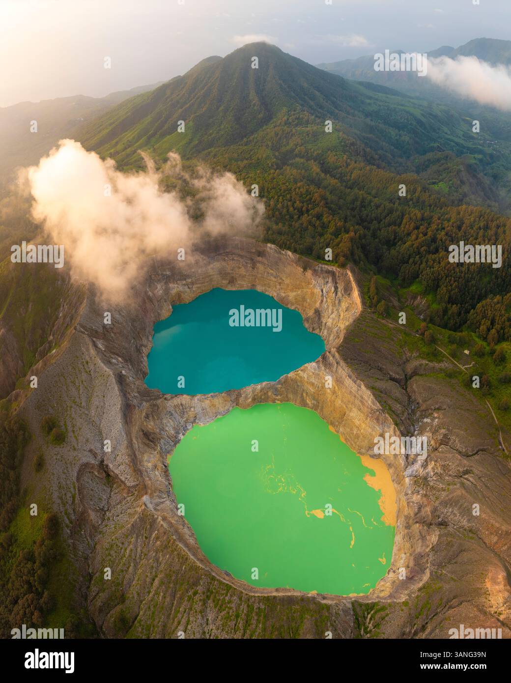 Aerial view of the stunning Kelimutu volcano with its vibrant crater ...