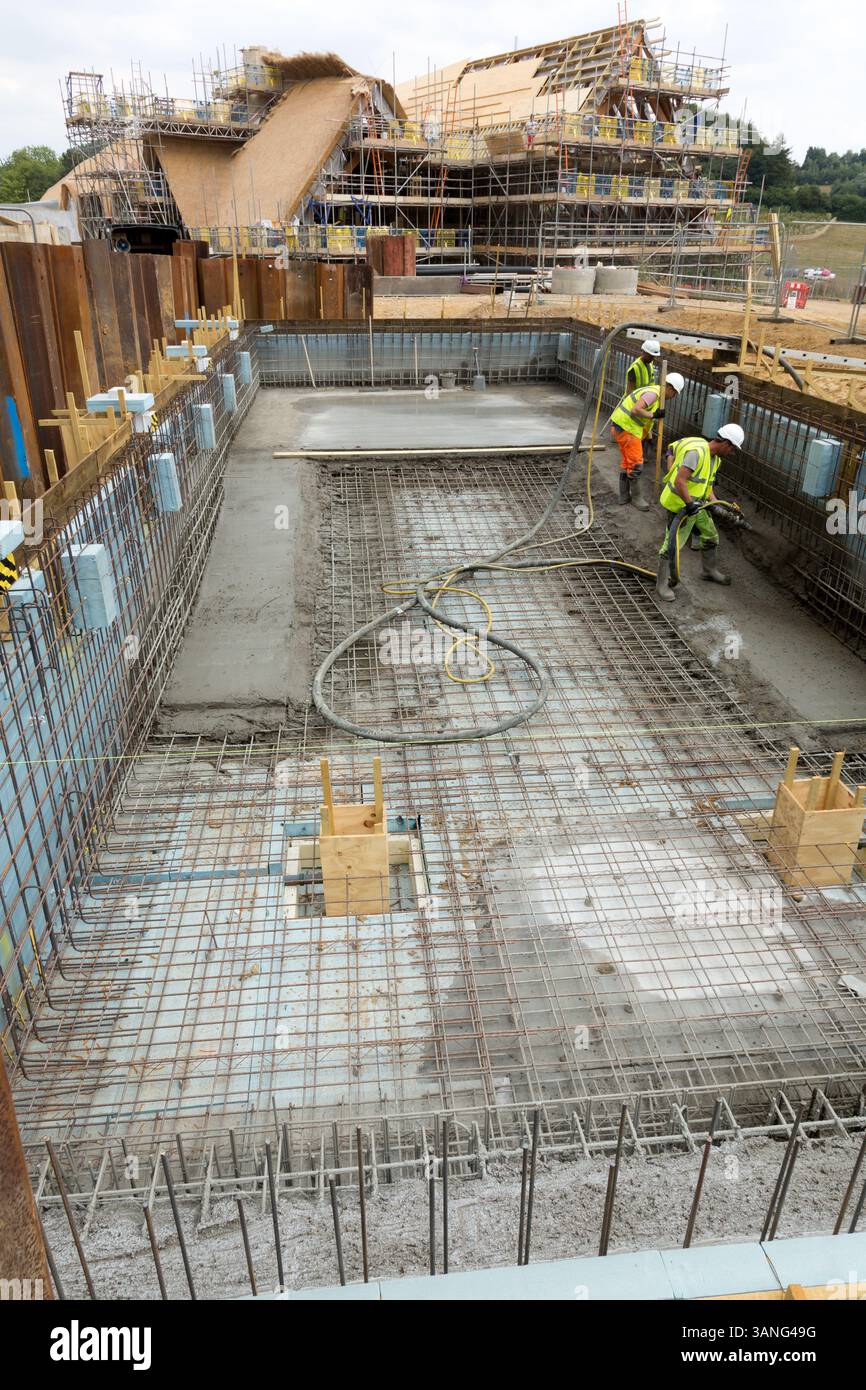 Concrete spraying in building constructiom Stock Photo - Alamy