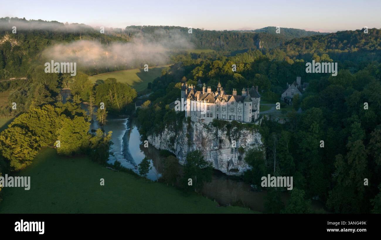 Aerial view of the medieval Walzin castle overlooking the river amidst ...