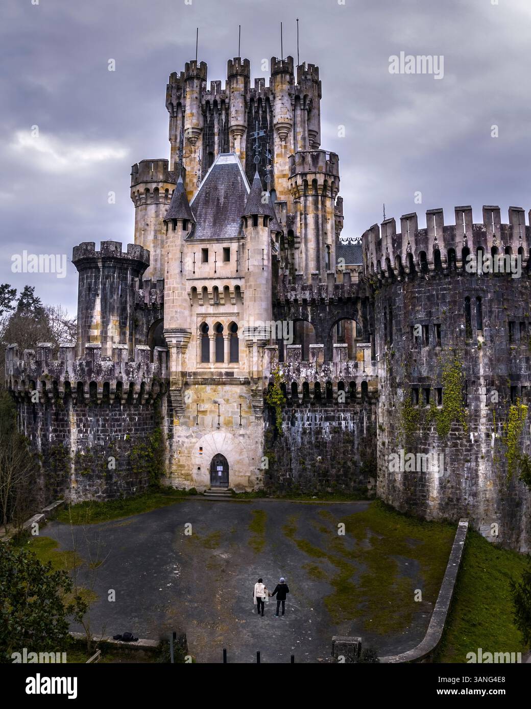 Aerial view of the historic and abandoned Castillo de Butron surrounded ...