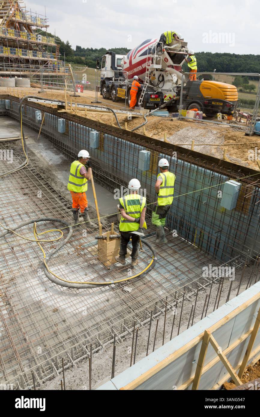 Concrete spraying in building constructiom Stock Photo - Alamy