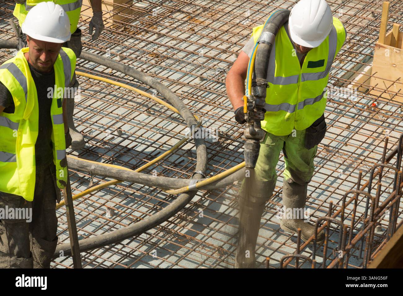 Concrete spraying in building constructiom Stock Photo - Alamy