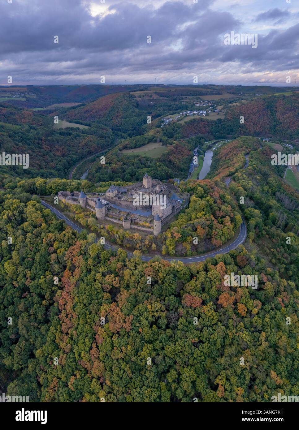 Aerial drone view of Bourscheid castle on forest hill top with ...
