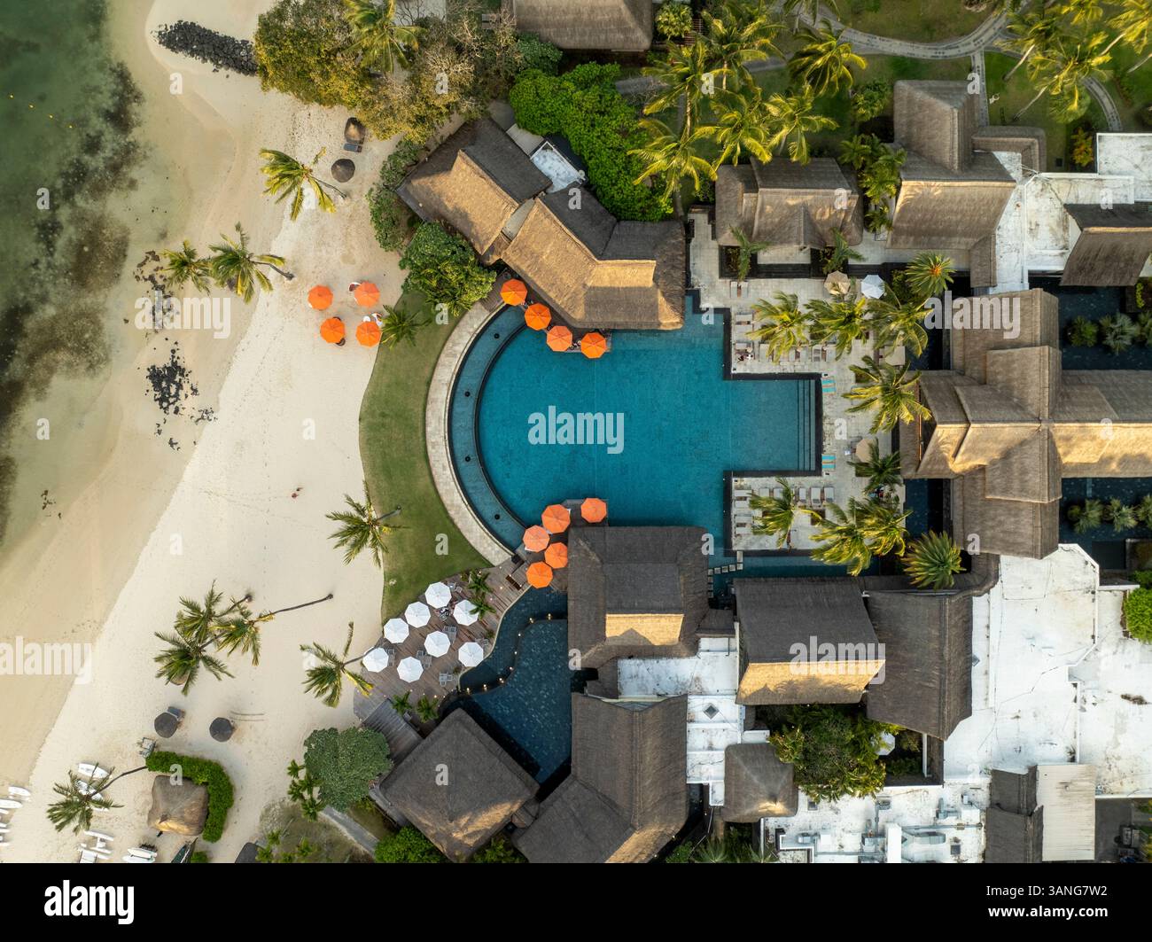 Aerial view of luxurious resort with swimming pool and sandy beach ...