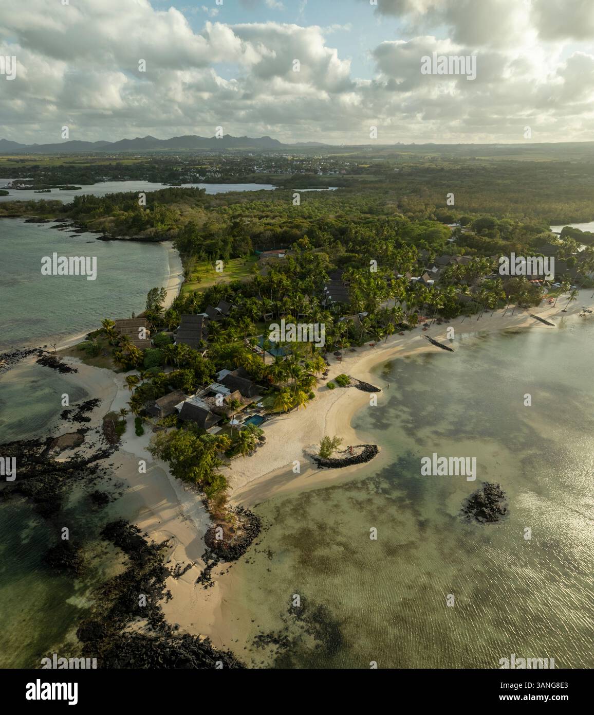 Aerial view of beautiful tropical beach and serene lagoon with luxury ...
