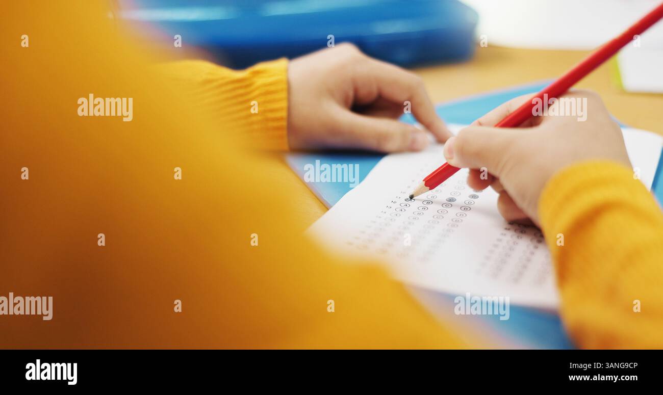 Education, student and hands with quiz answer for multiple choice ...
