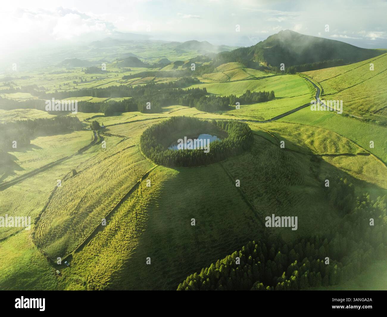 Aerial view of Seven Lakes with lush mountains and serene lake, Capelas ...