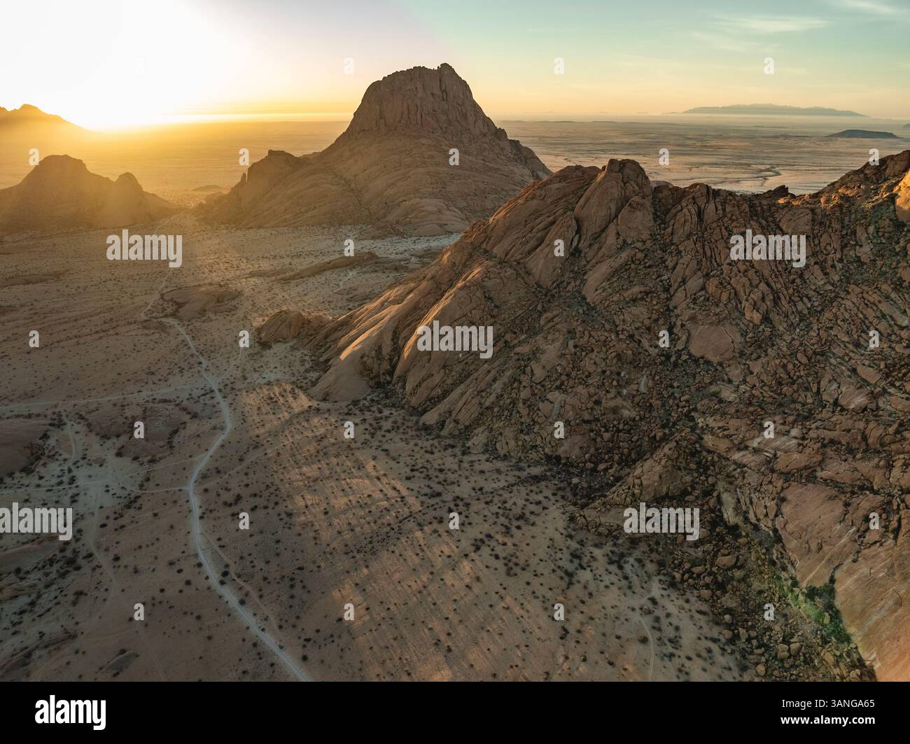 Aerial view of majestic Spitzkoppe Peak at sunset in Namib desert ...