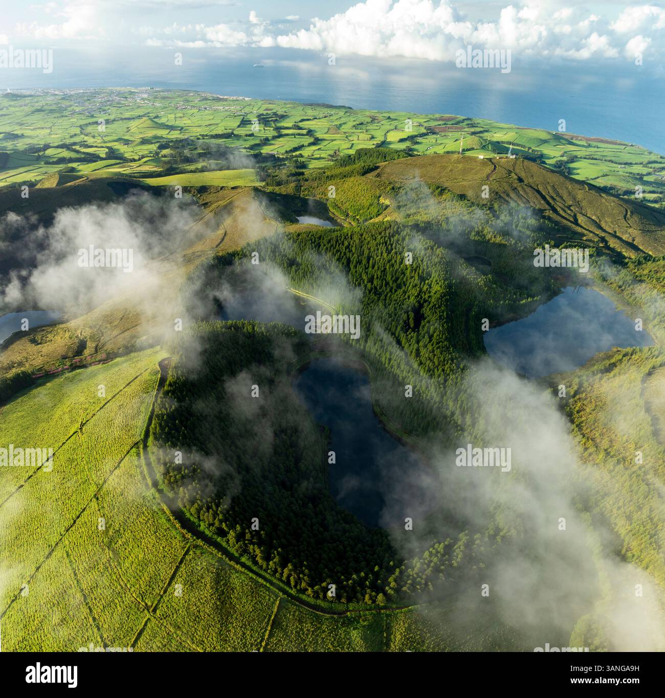 Aerial view of lush forest surrounding Seven Lakes, Capelas, Azores ...