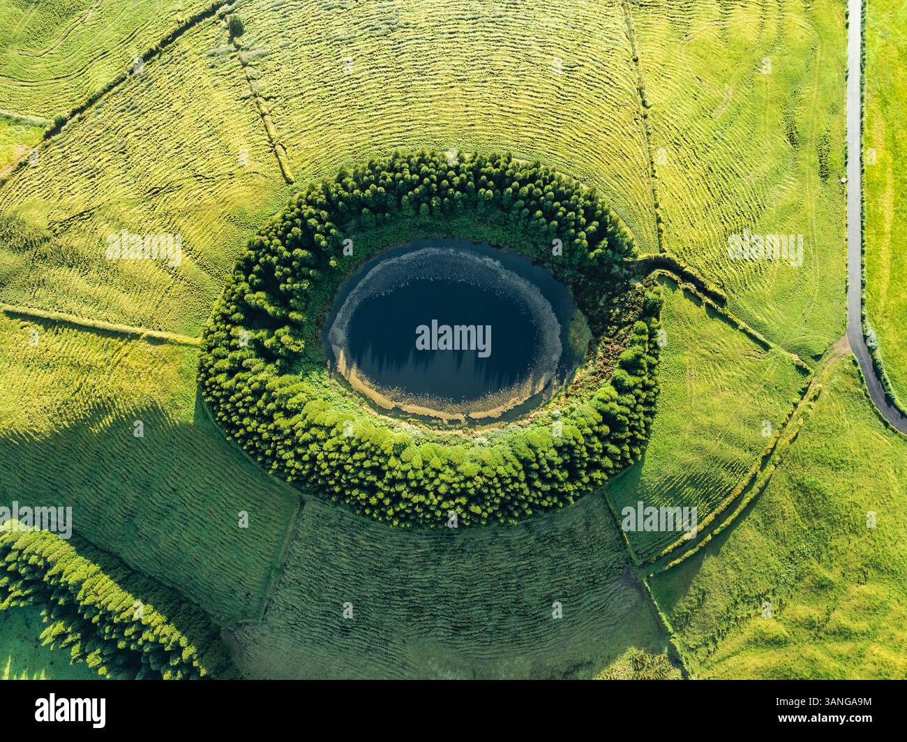 Aerial view of Seven Lakes with lush forest and fields, Capelas, Azores ...