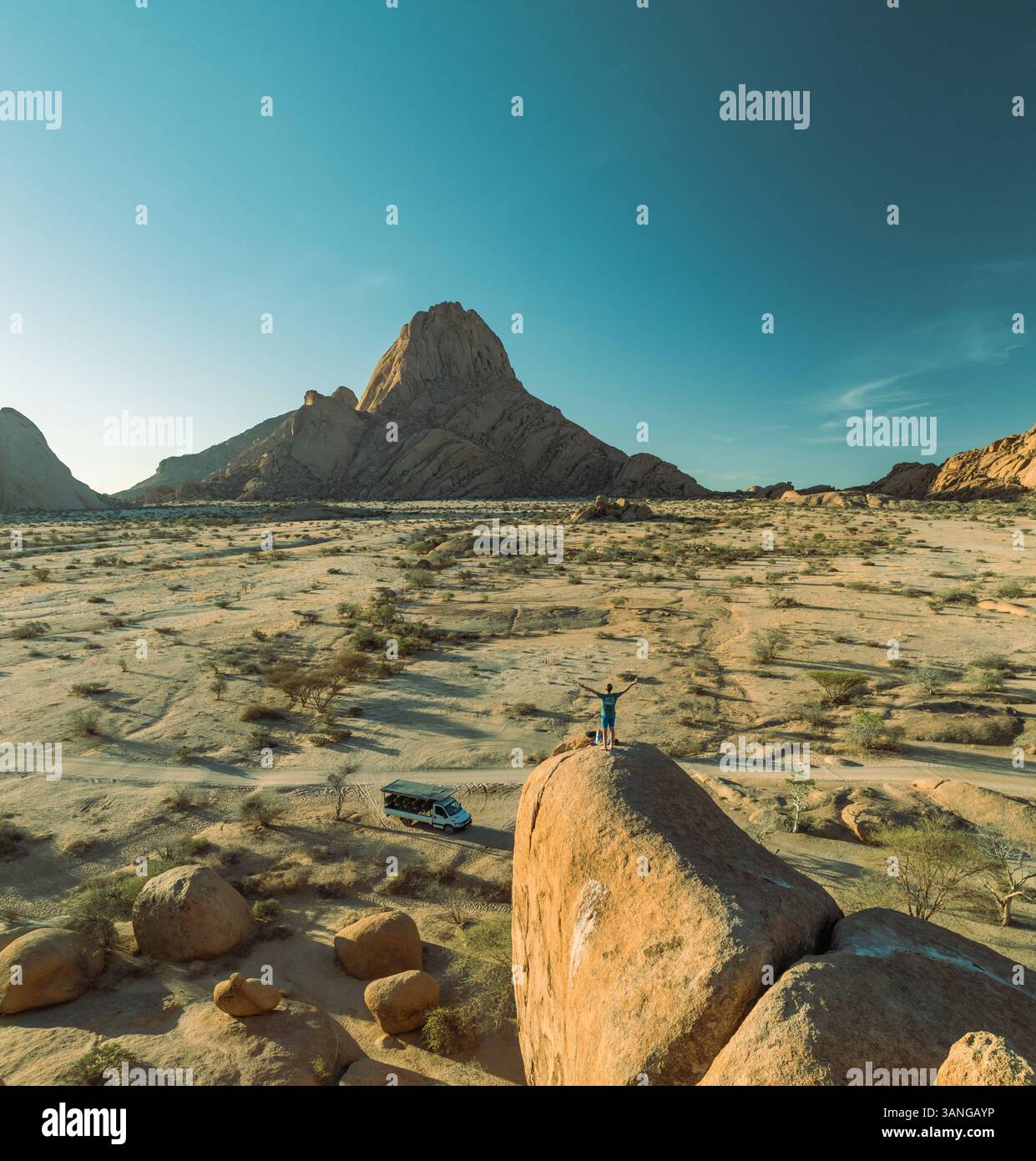 Aerial view of Spitzkoppe Peak with person, Namib Desert, Namibia Stock ...