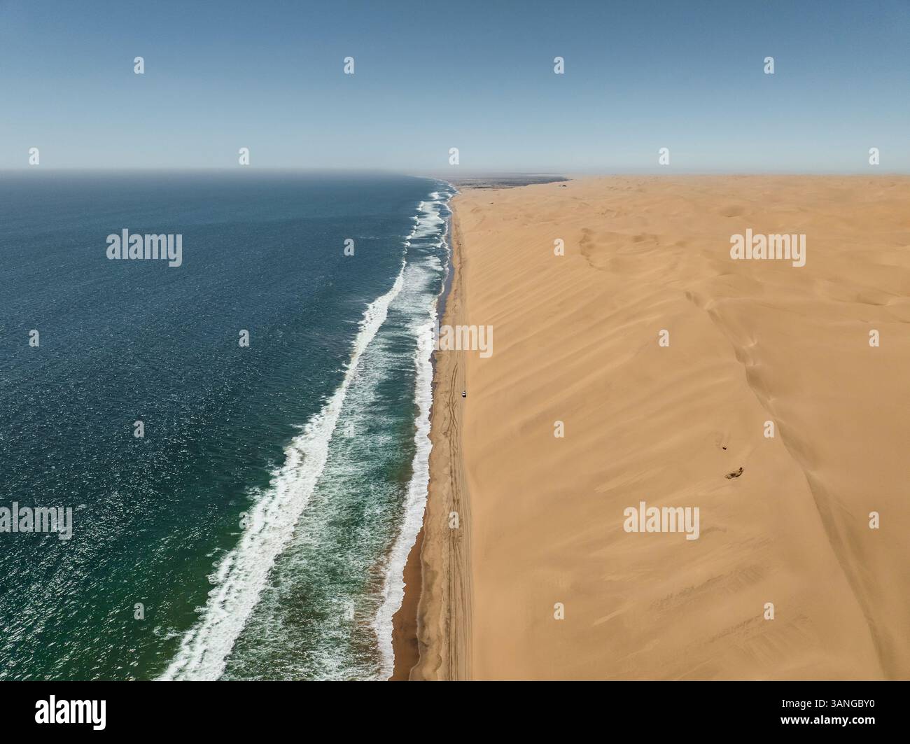 Aerial view of sandy desert dunes at Sandwich Harbour, Erongo, Namibia ...