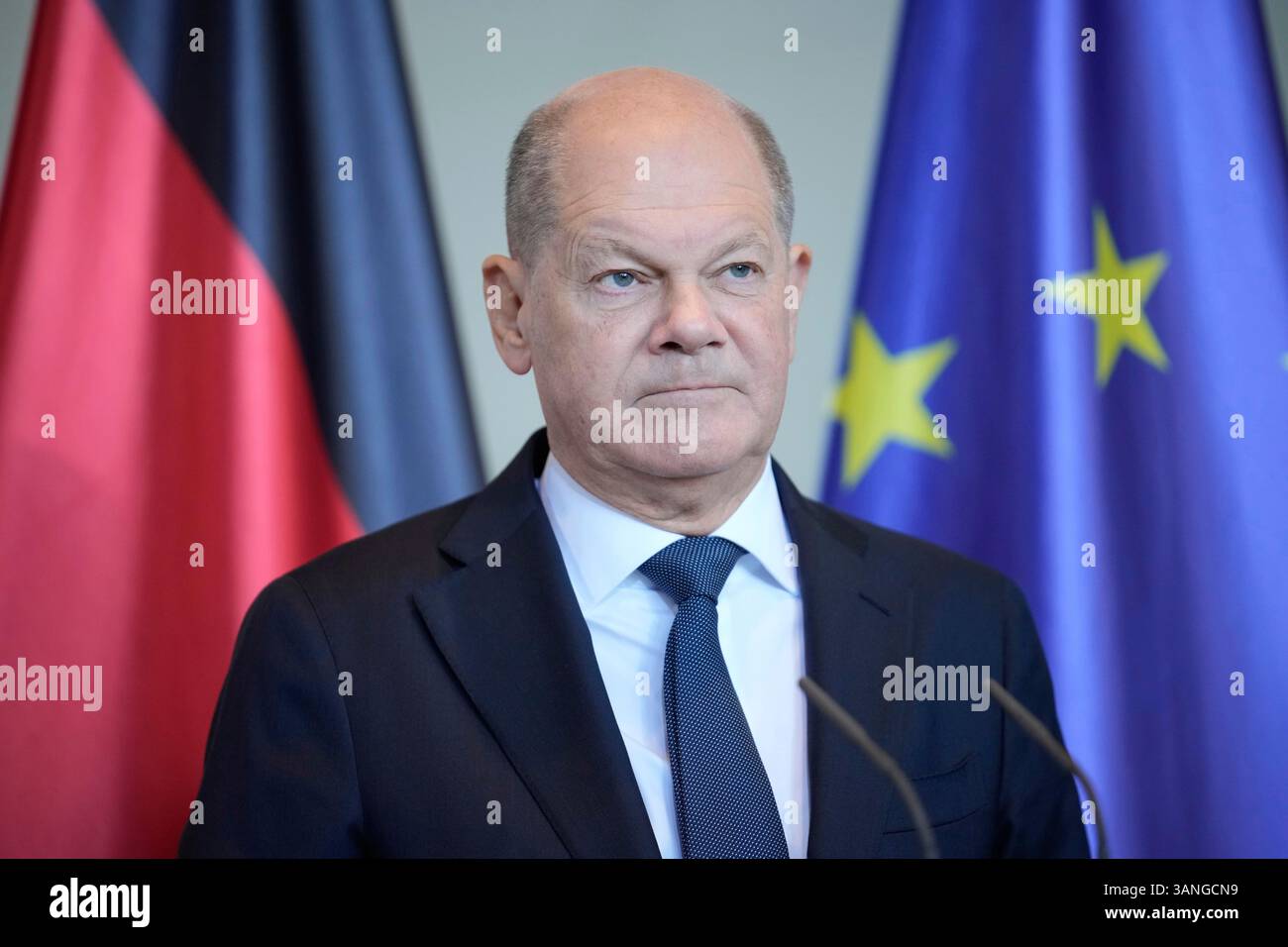 FILE - German Chancellor Olaf Scholz listens during a news conference ...