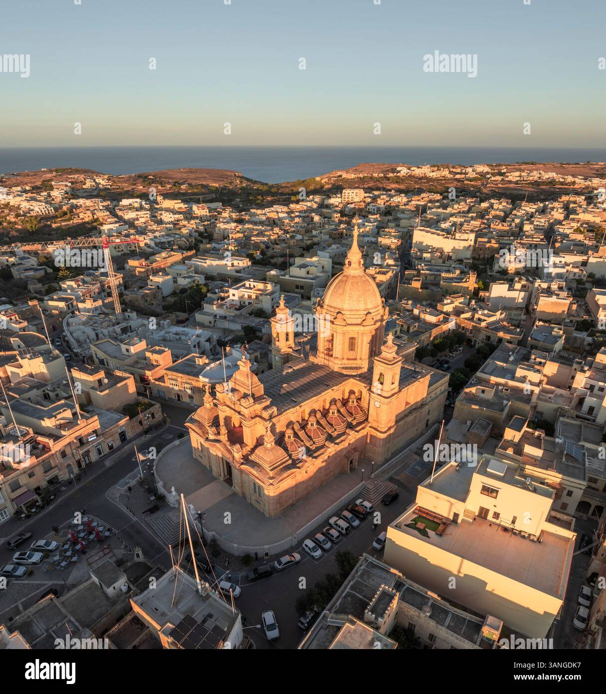 Aerial view of Ghajnsielem Parish church with Mediterranean Sea ...