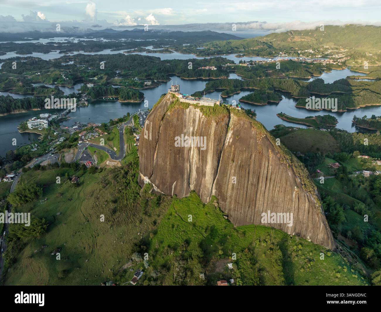 Aerial view of Embalse de Penol with La Piedra del Penol, Guatape ...