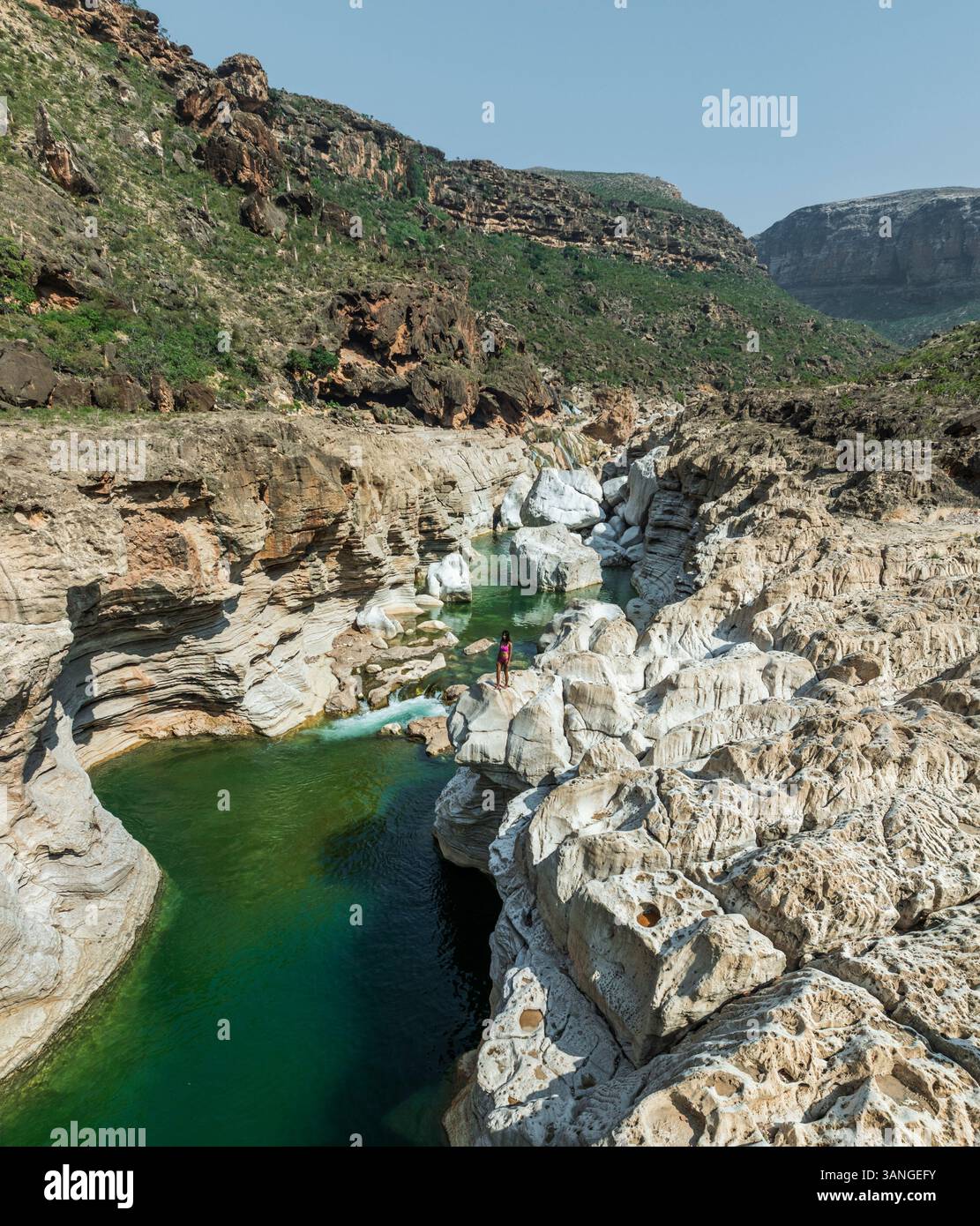 Aerial view of Kalysan Canyon with woman, Kalleesa, Socotra, Yemen ...
