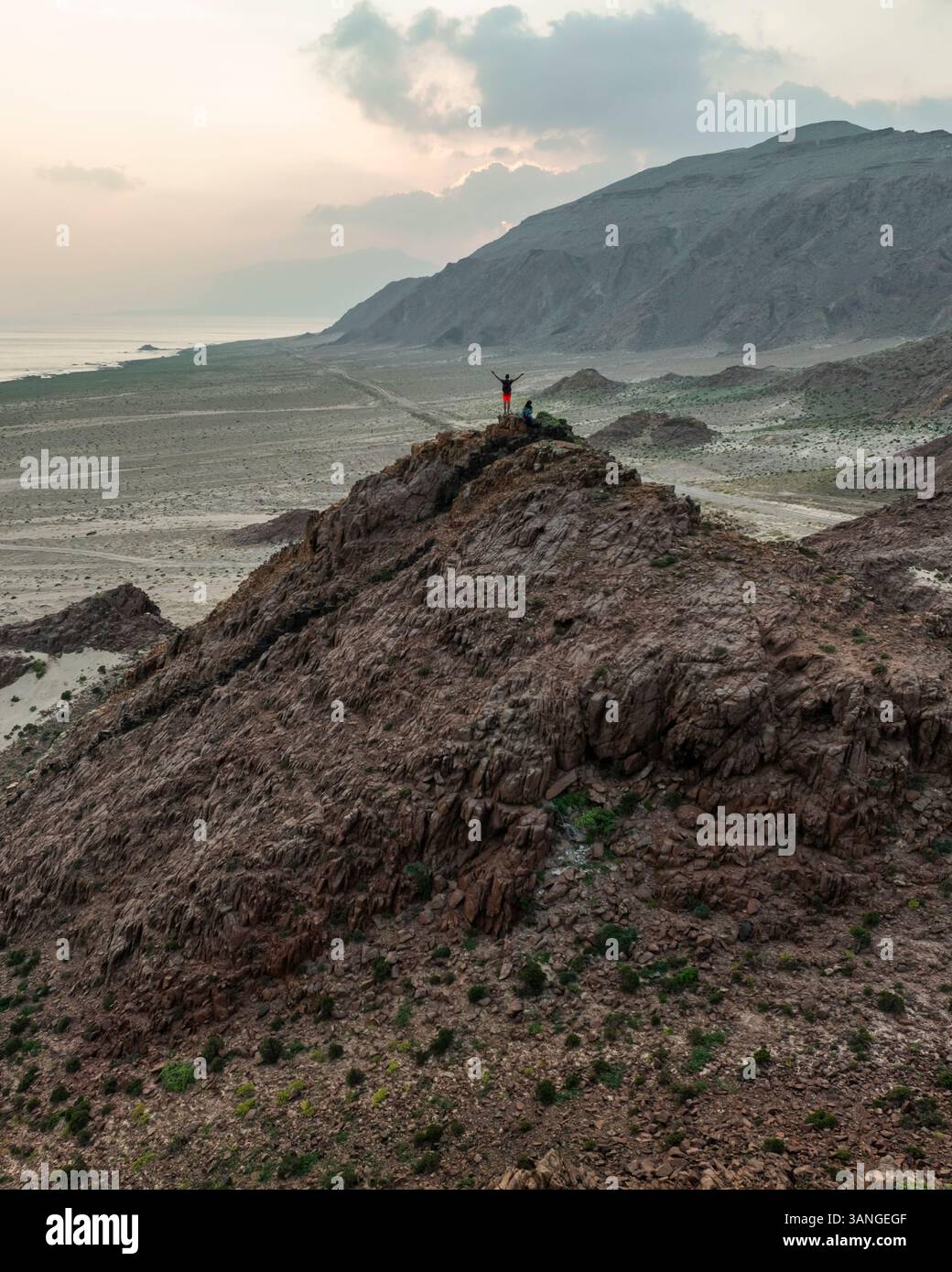 Aerial view of arid desert landscape with high mountain forms, Irisseyl ...
