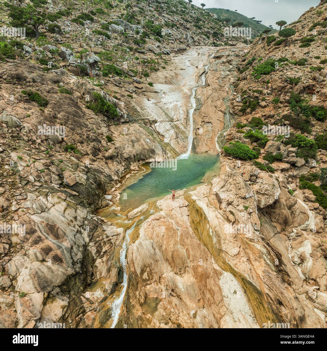 Aerial view of transparent river flowing through beautiful canyon with ...