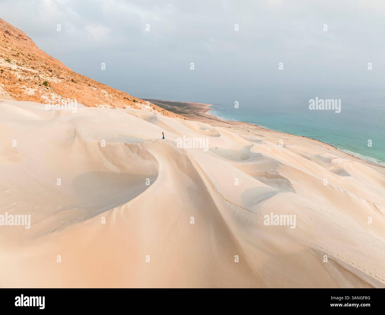 Aerial view of Arher sand dune with woman, Kalleesa, Socotra, Yemen Stock Photo - Alamy