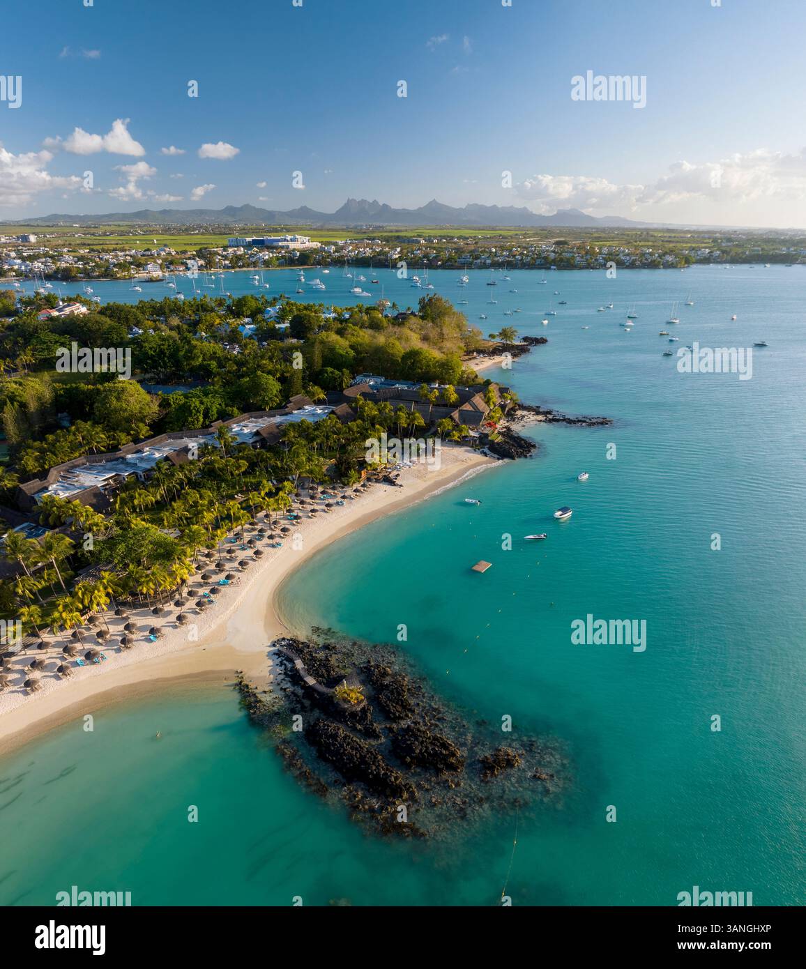 Aerial view of Royal Palm hotel with white sand beach and blue water ...