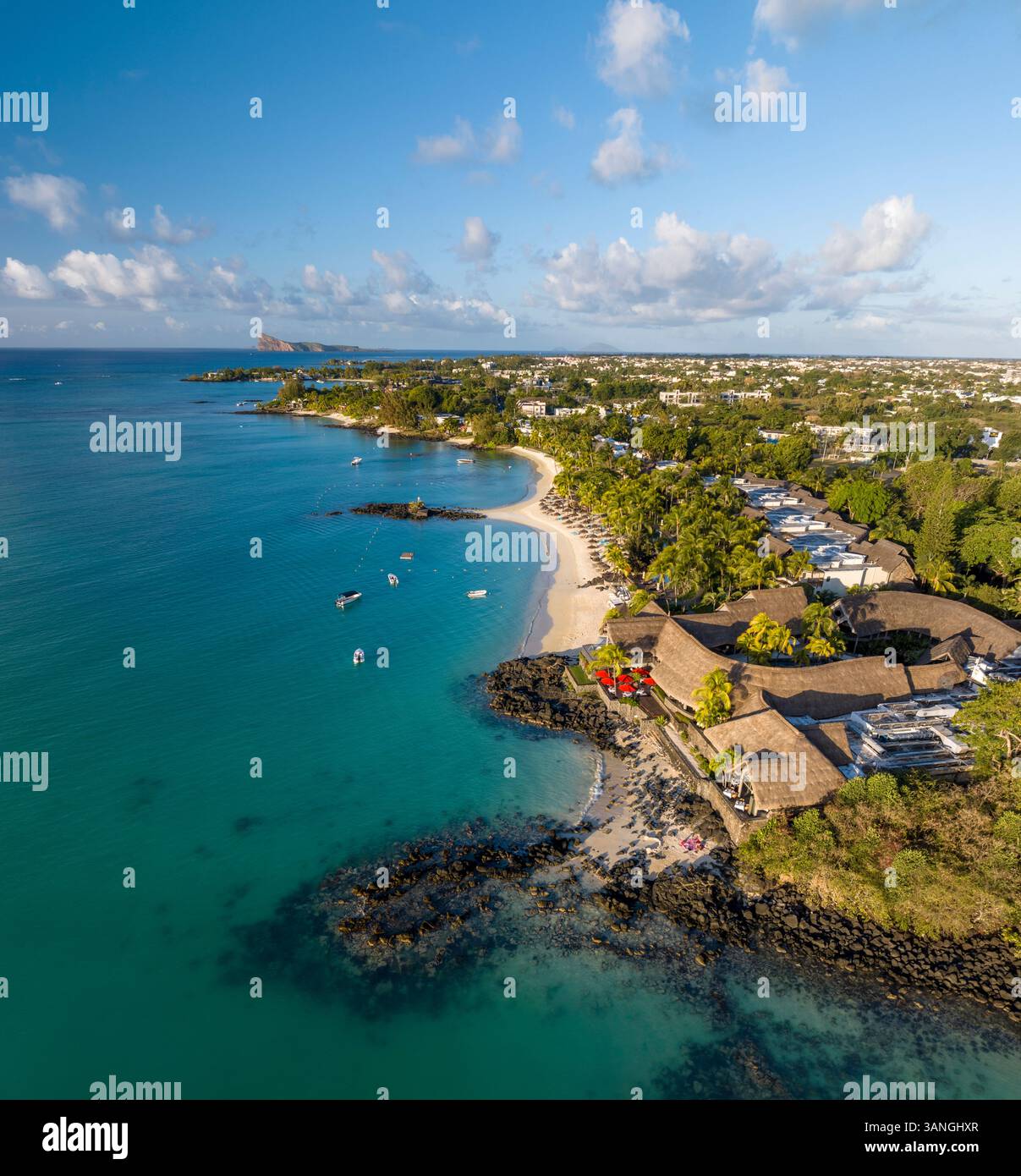 Aerial view of the beautiful white sand beach and clear blue water at ...
