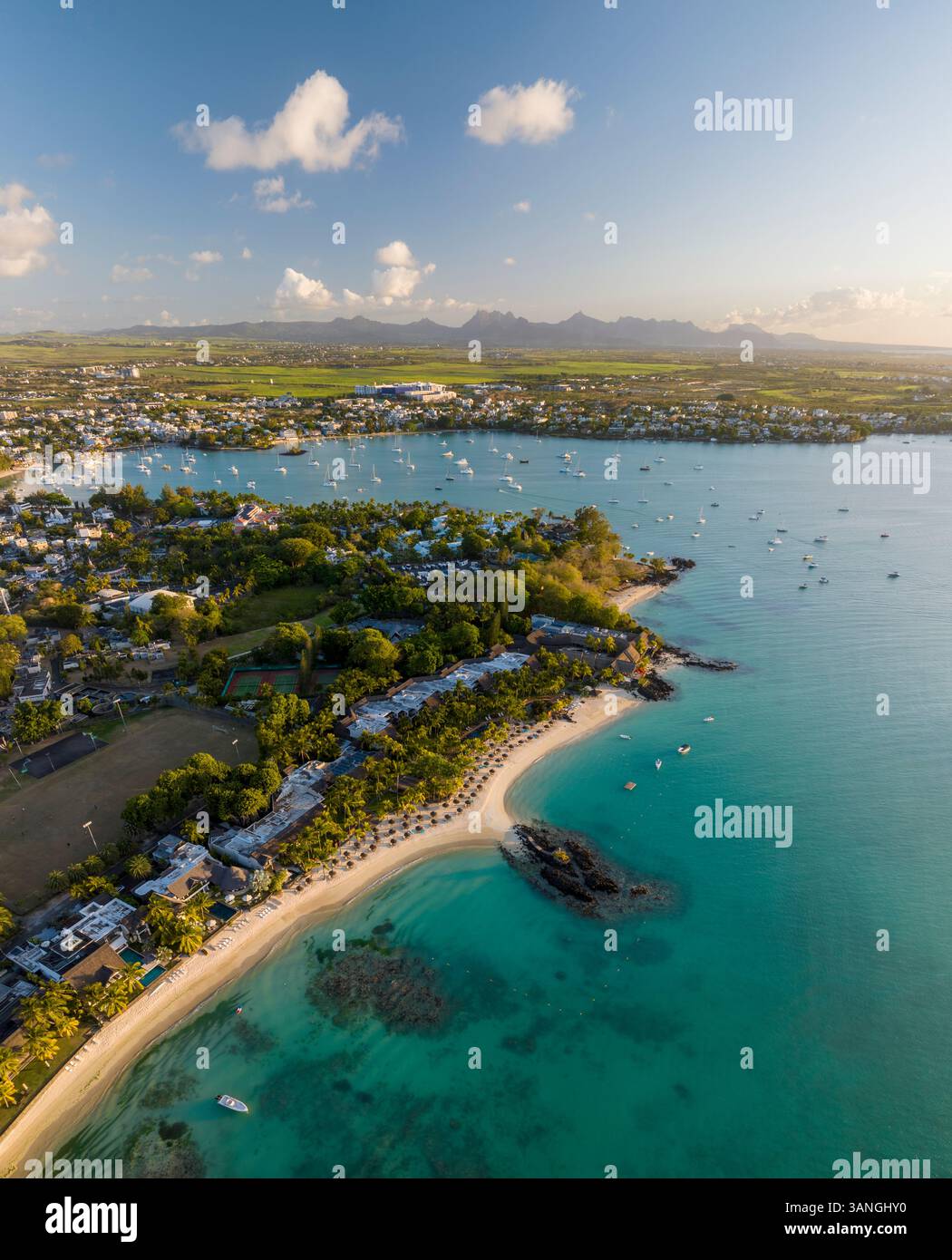 Aerial view of white sand beach with clear blue water and boats, Royal ...