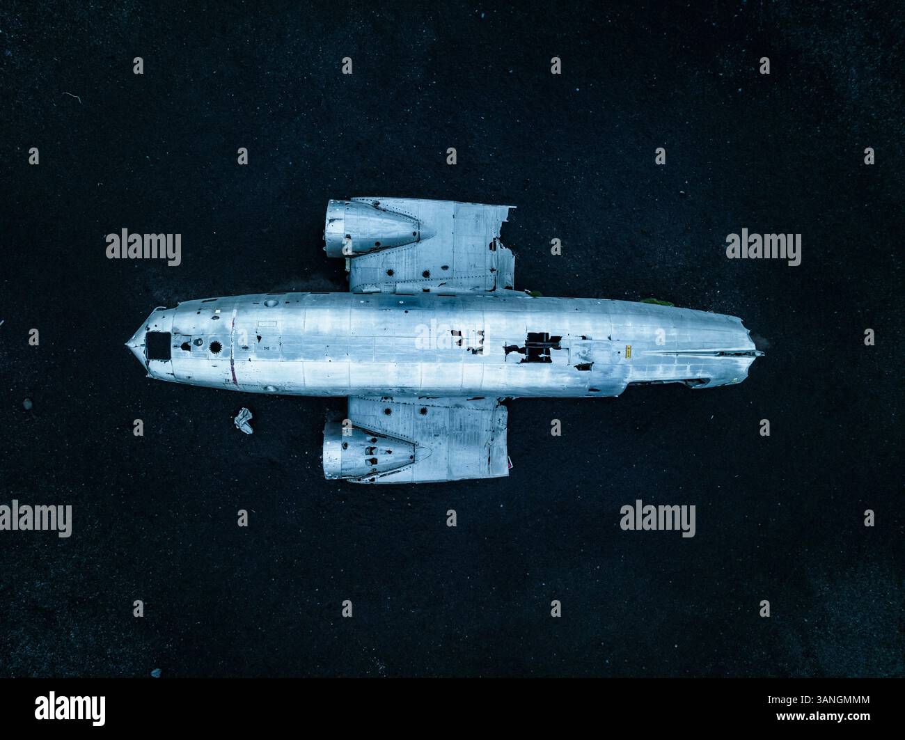 Aerial view of abandoned plane wreck on black sand beach, Vik i Myrdal ...