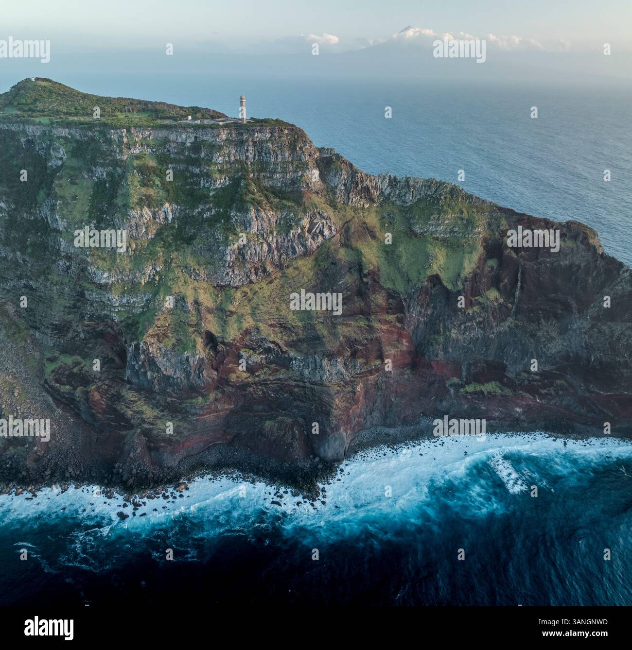 Aerial view of Farol dos Rosais lighthouse on Sao Jorge Island, Azores ...